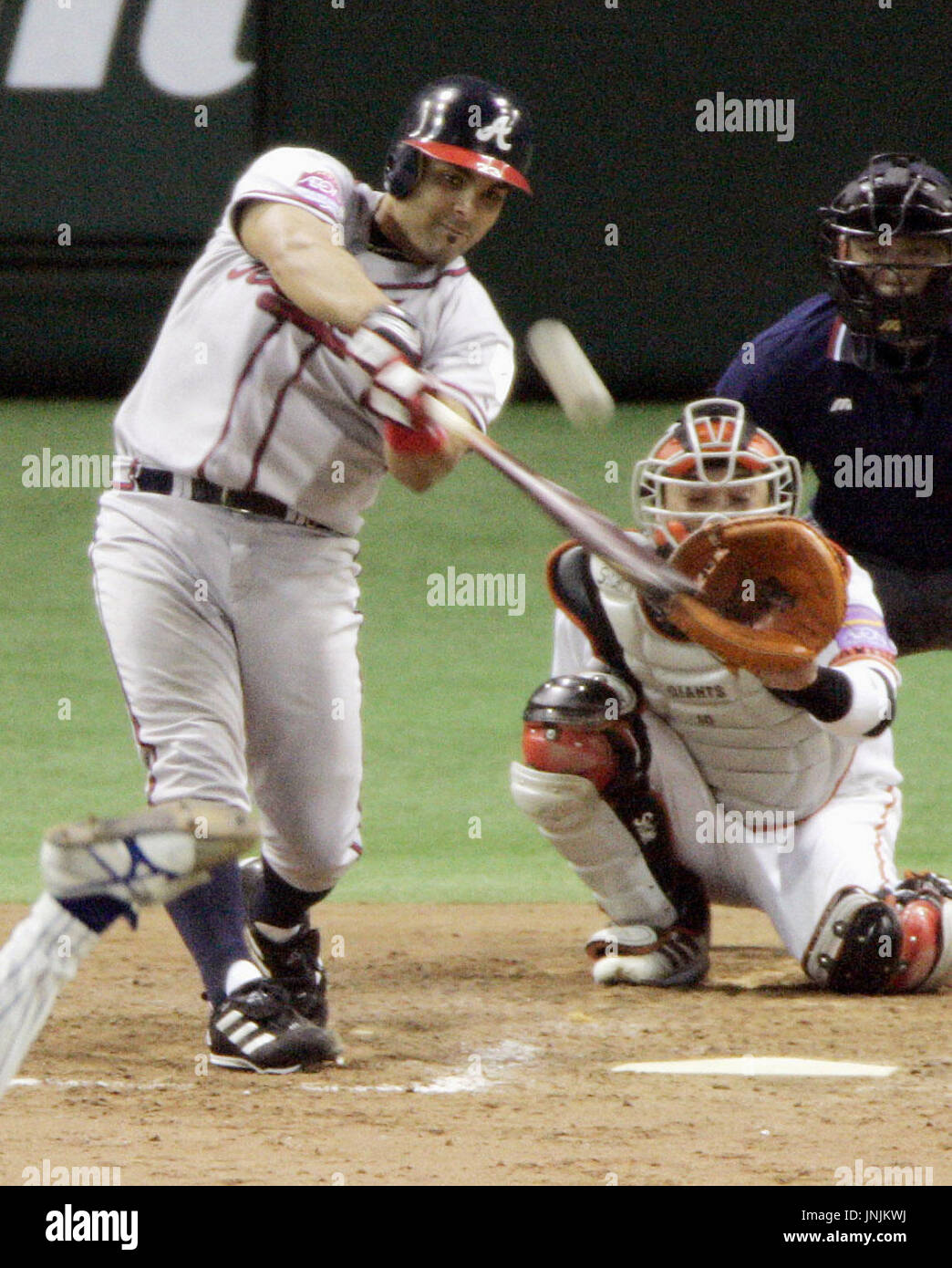 TOKYO, Japan - Atlanta Braves Johnny Estrada hits a solo homer in the ...