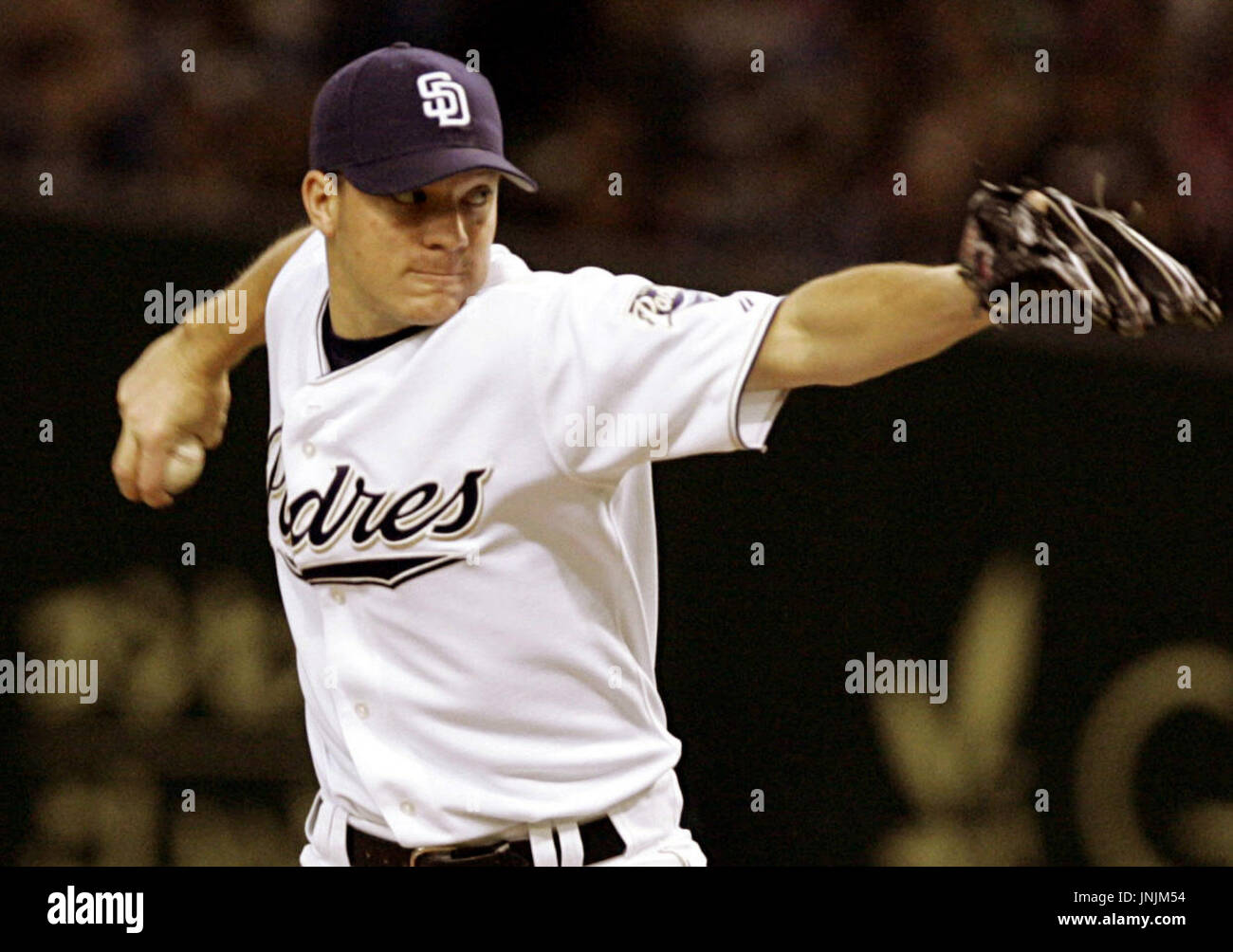 TOKYO, Japan - Jake Peavy of the San Diego Padres holds the Japanese ...