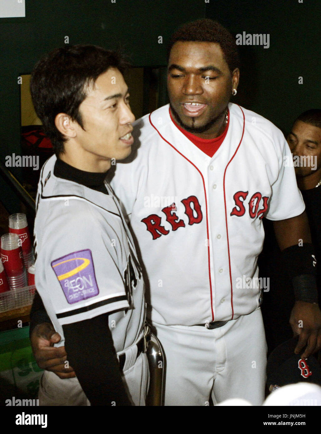 TOKYO, Japan - Hanshin Tigers outfielder Norihito Akahoshi (R) poses ...