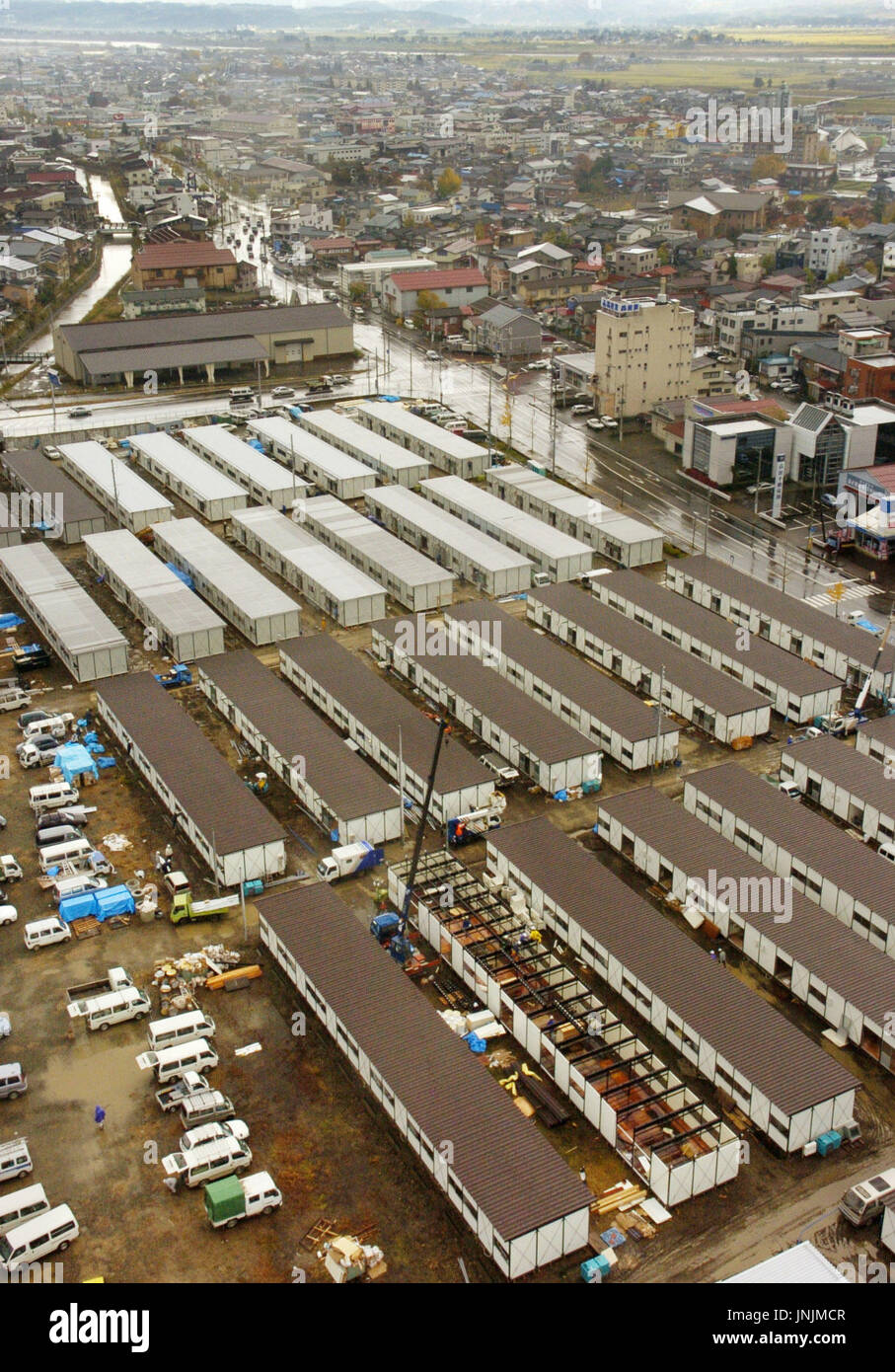 NAGAOKA, Japan - A makeshift housing complex is being built in Nagaoka ...