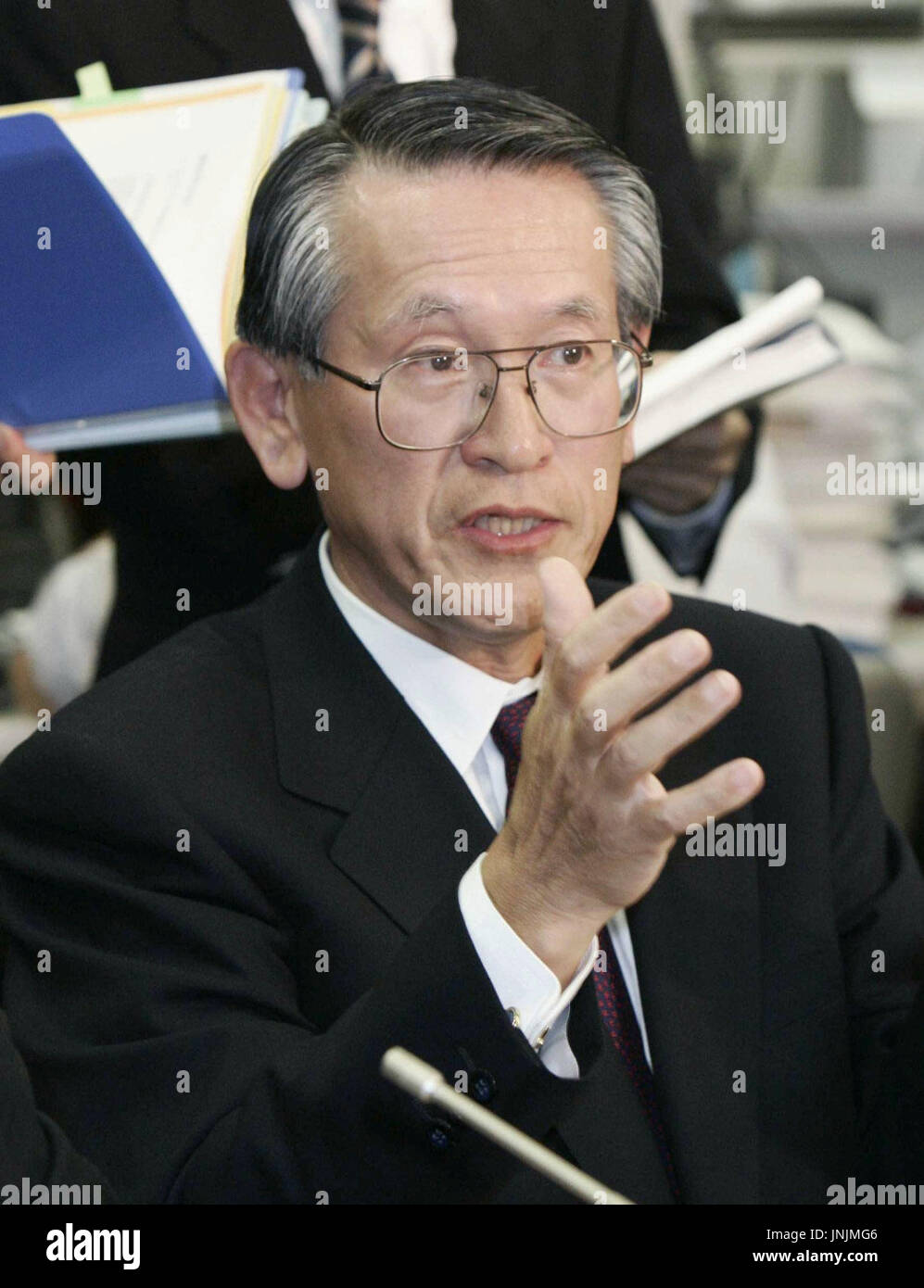 TOKYO, Japan - Mitsubishi Tokyo Financial Group Inc. President Nobuo Kuroyanagi speaks at a ...