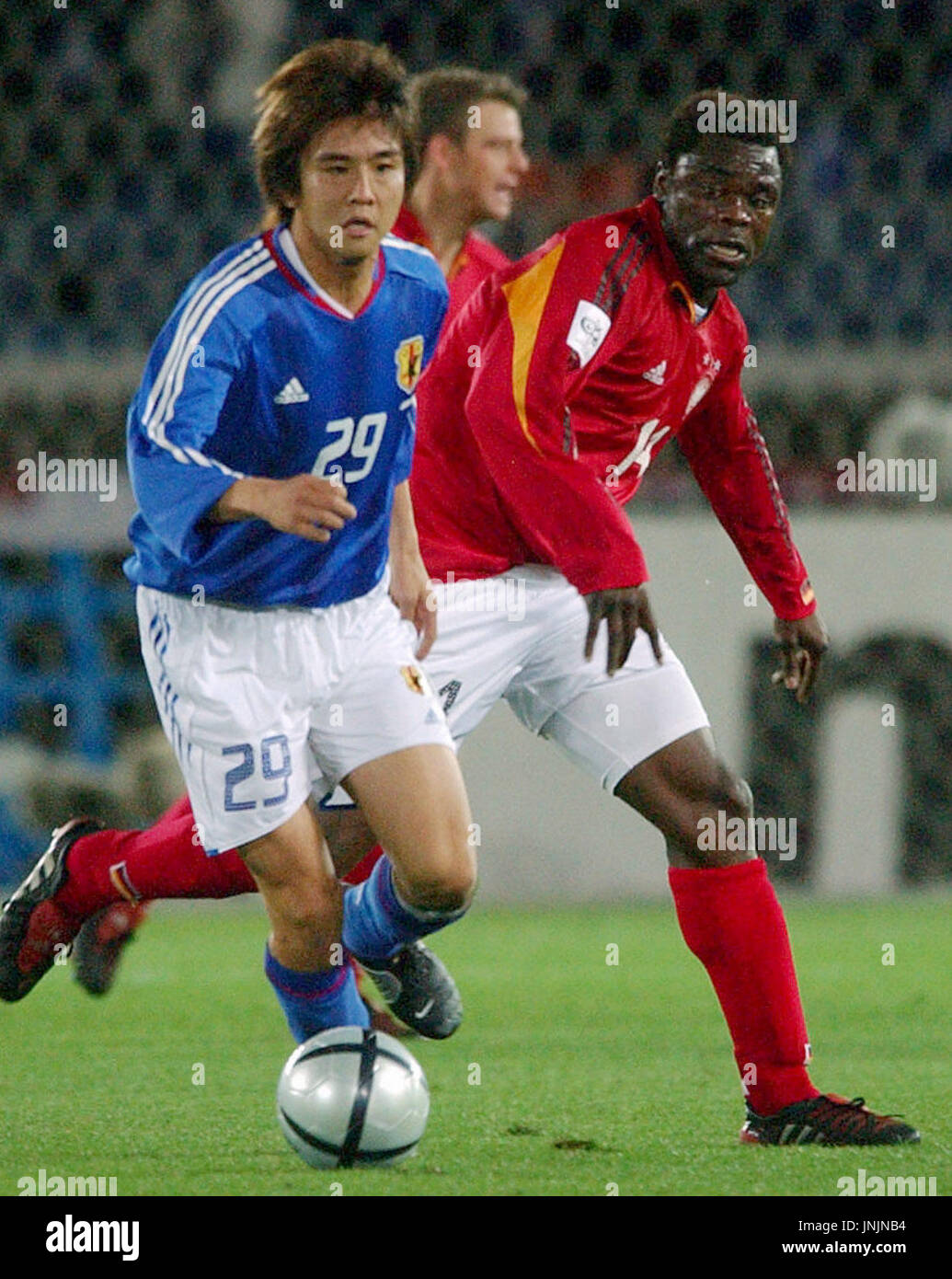 YOKOHAMA, Japan - Japanese midfielder Junichi Inamoto breaks away as ...