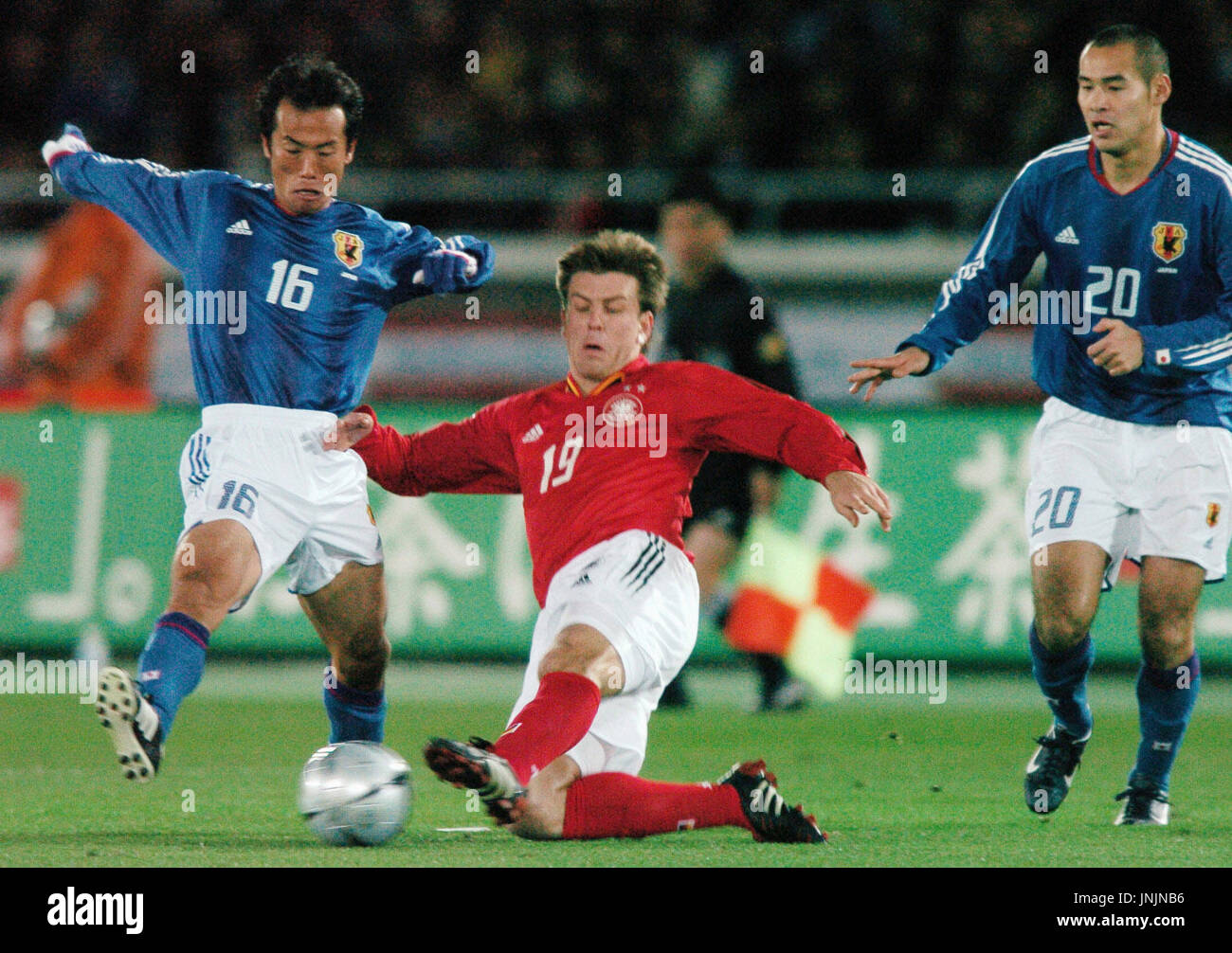 YOKOHAMA, Japan - Japanese midfielder Toshiya Fujita (L) and German ...