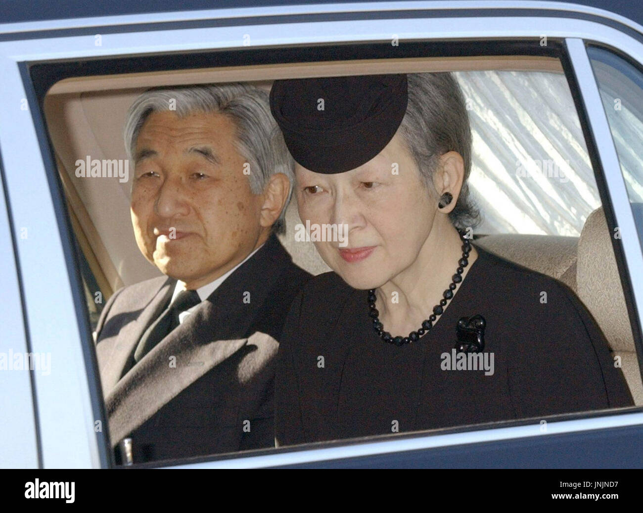 TOKYO, Japan - Emperor Akihito and Empress Michiko leave the home of ...