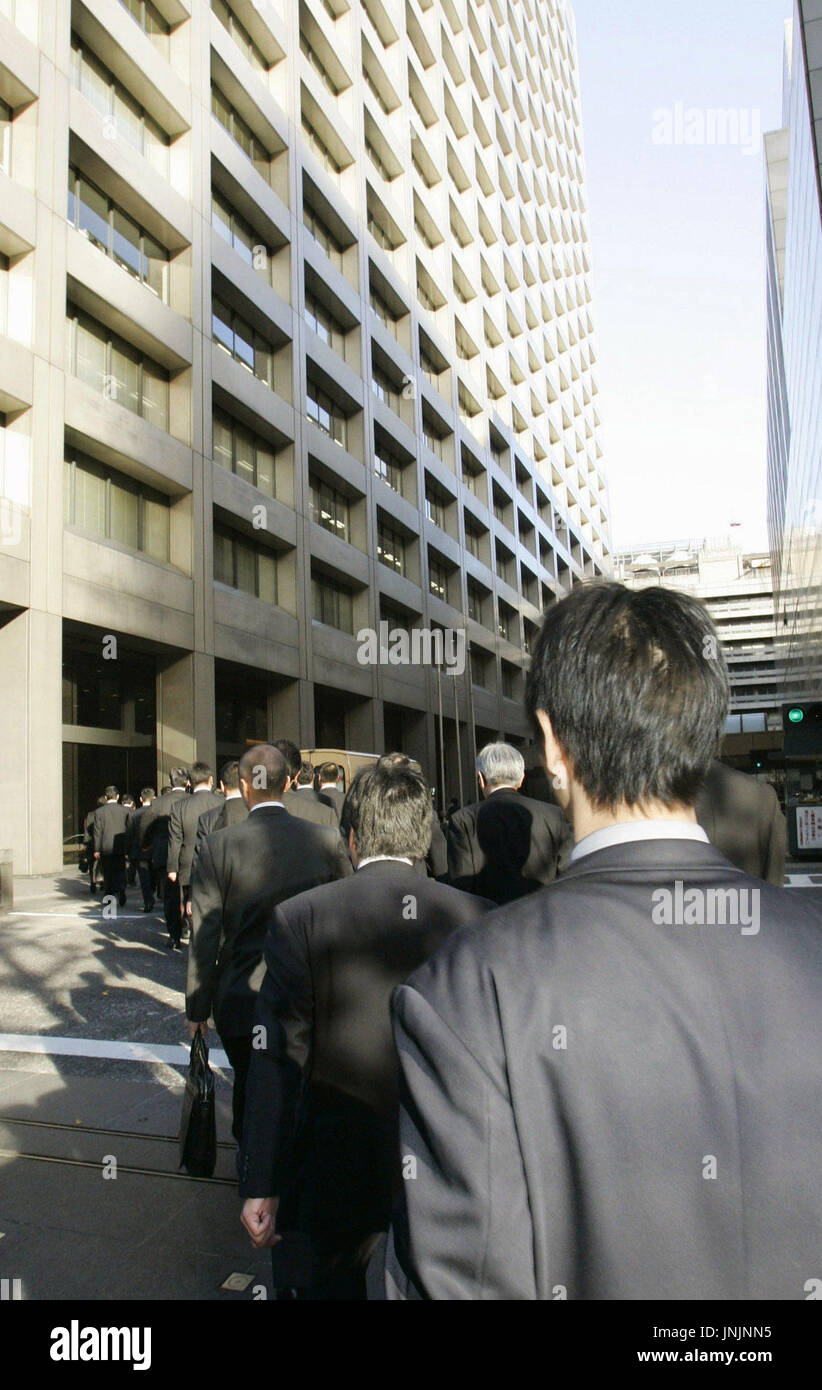 TOKYO, Japan - Tokyo Metropolitan Police Department officers enter the ...