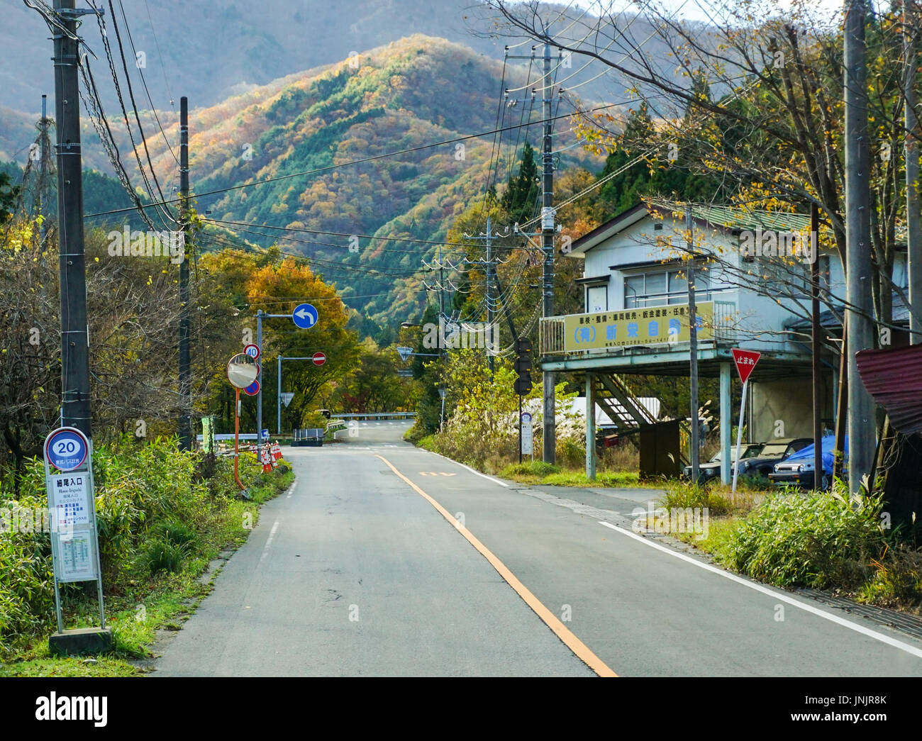 Nikko, Japan - Nov 3, 2014. Mountain road with houses in Nikko, Japan ...