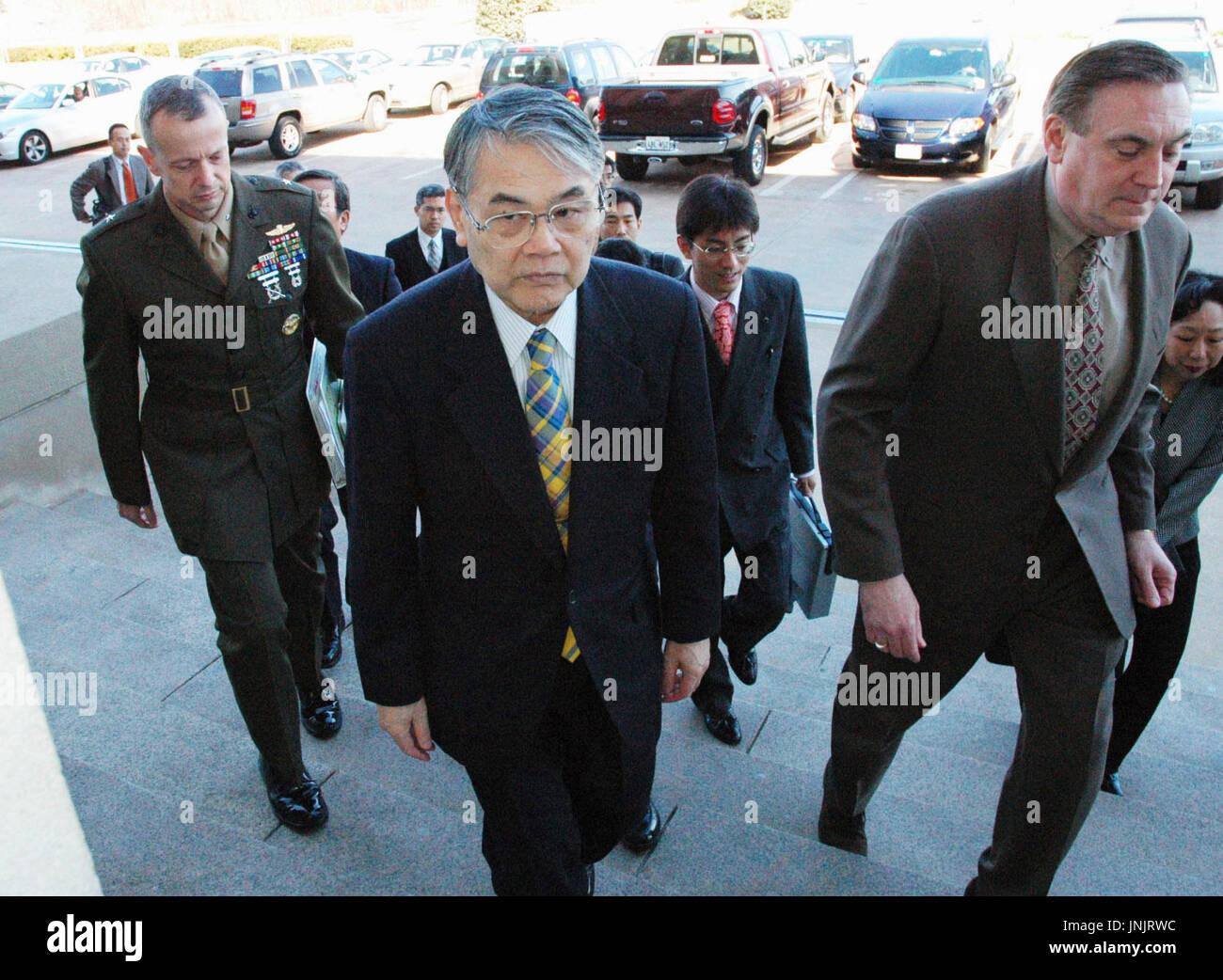 WASHINGTON, United States - Okinawa Gov. Keiichi Inamine (C) enters the ...