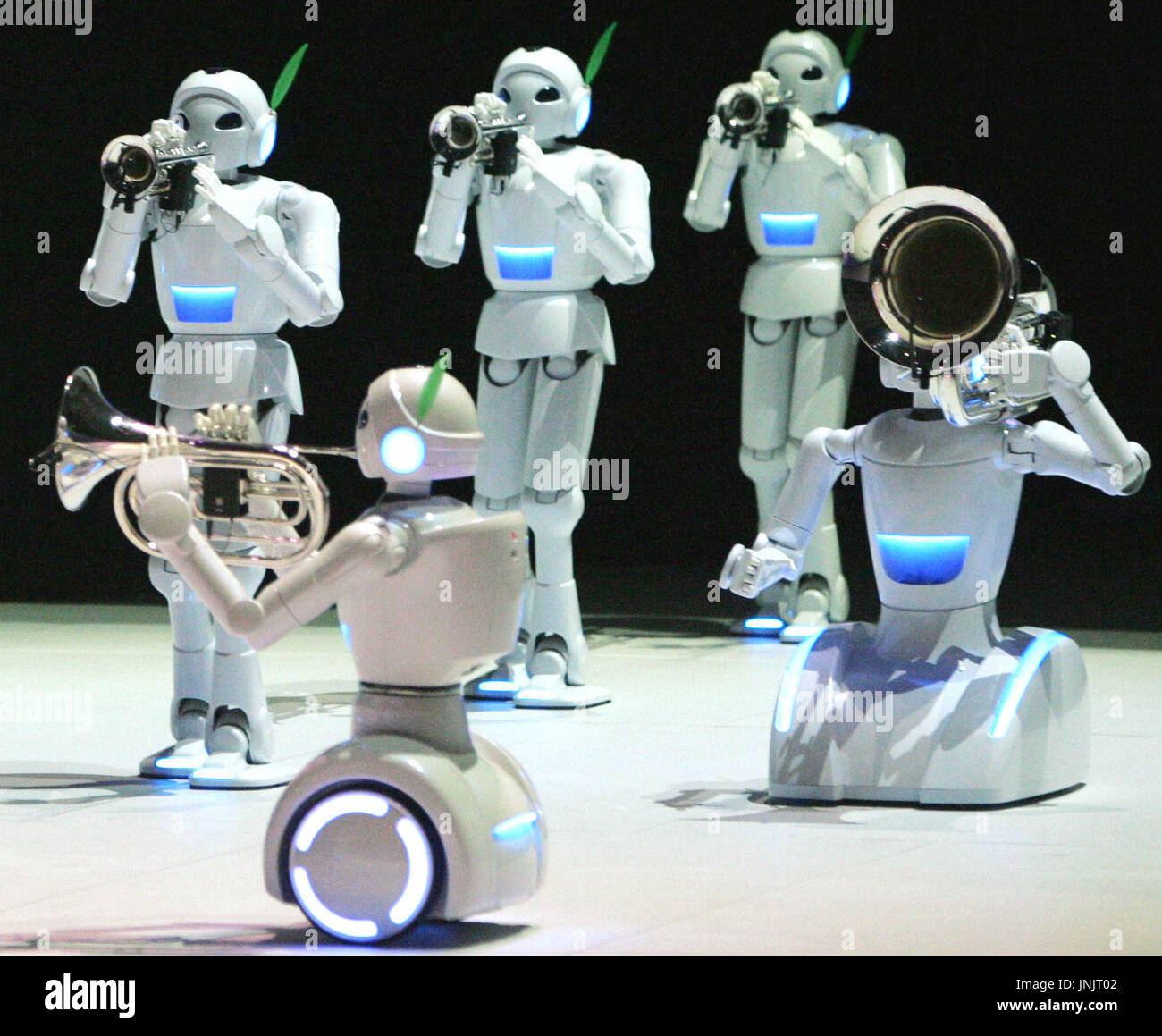 NAGOYA, Japan - A music band composed of humanoid robots gives a stage ...