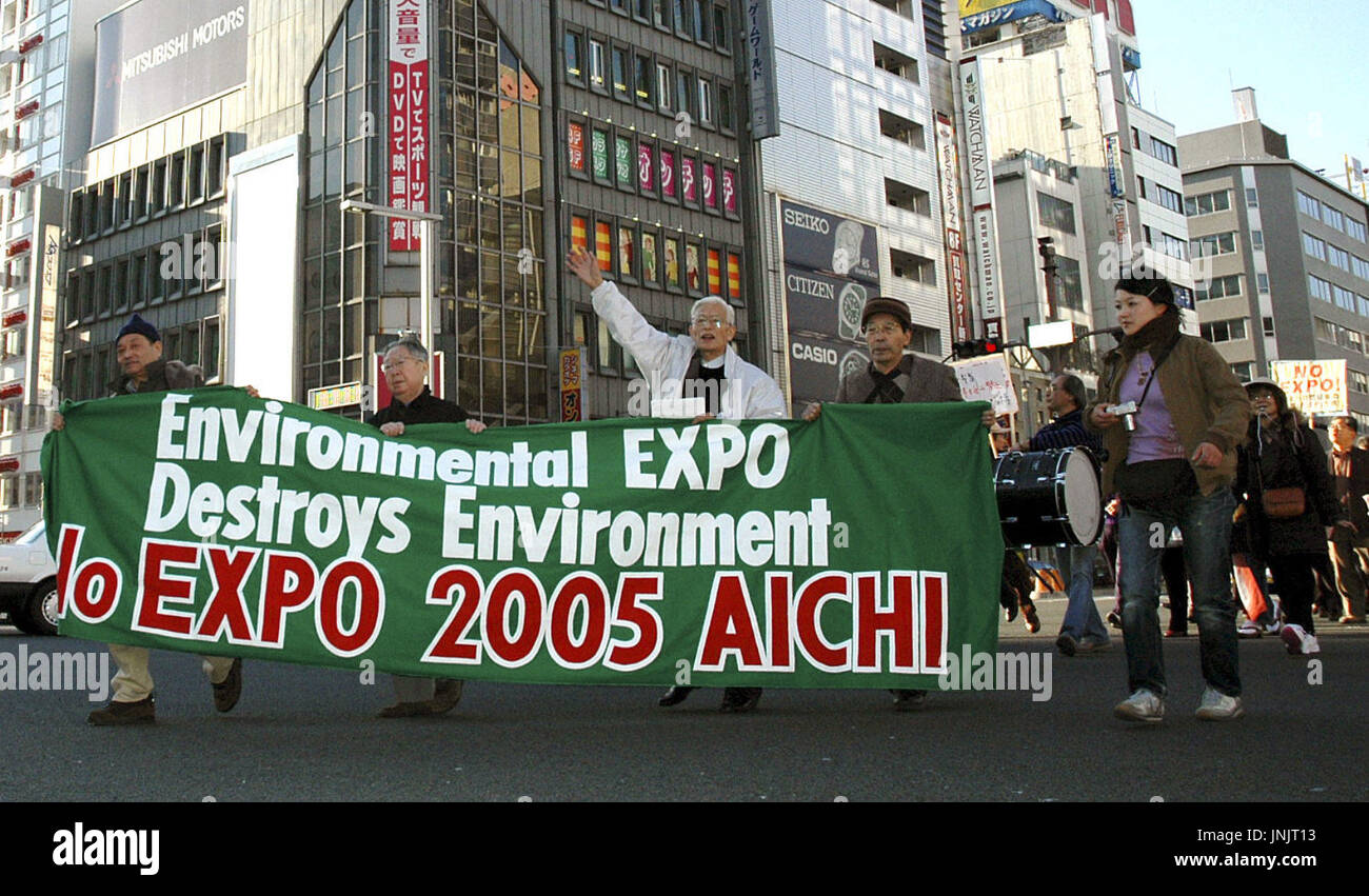 NAGOYA, Japan - Holding a banner, members of civic groups parade in ...