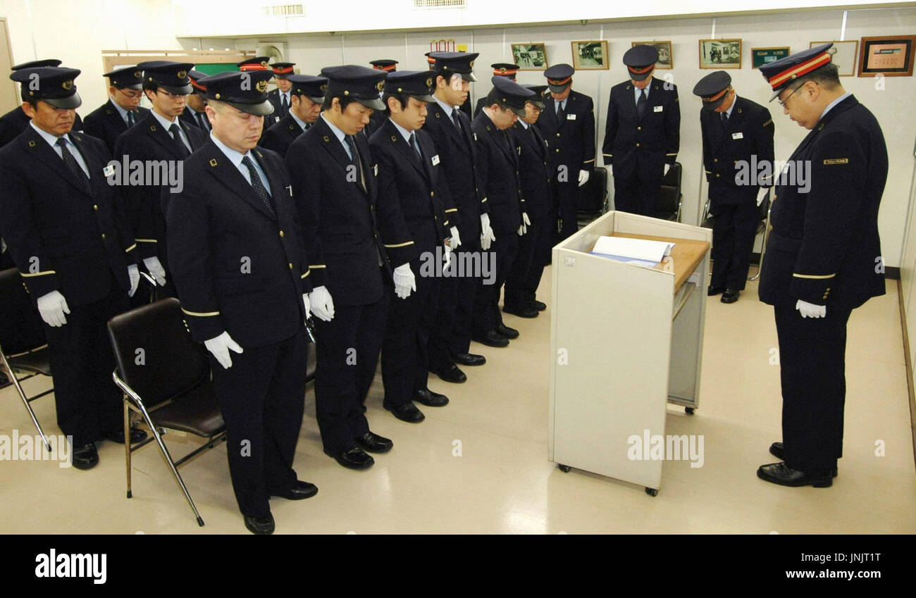 TOKYO, Japan - Station employees of Tokyo Metro Co. offer prayers for ...