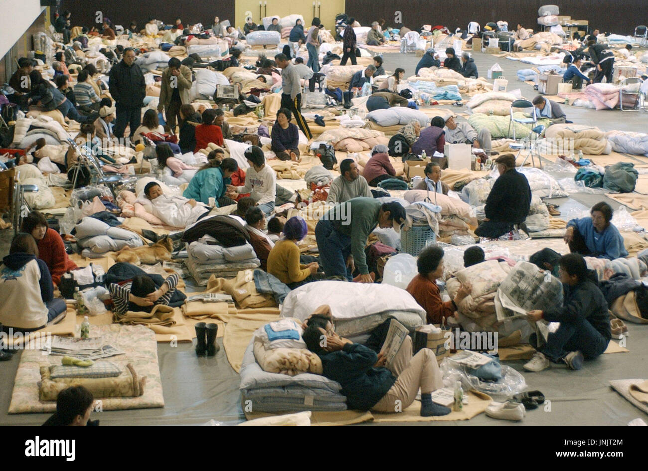 FUKUOKA, Japan - Residents of Genkai Island take shelter at a gymnasium ...
