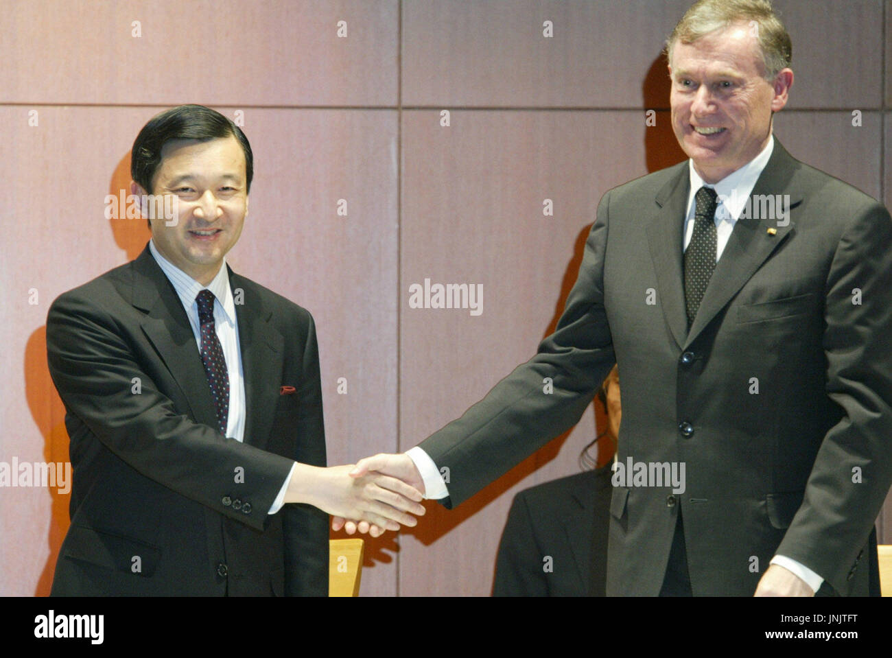 TOKYO, Japan - German President Horst Koehler (R) shakes hands with ...
