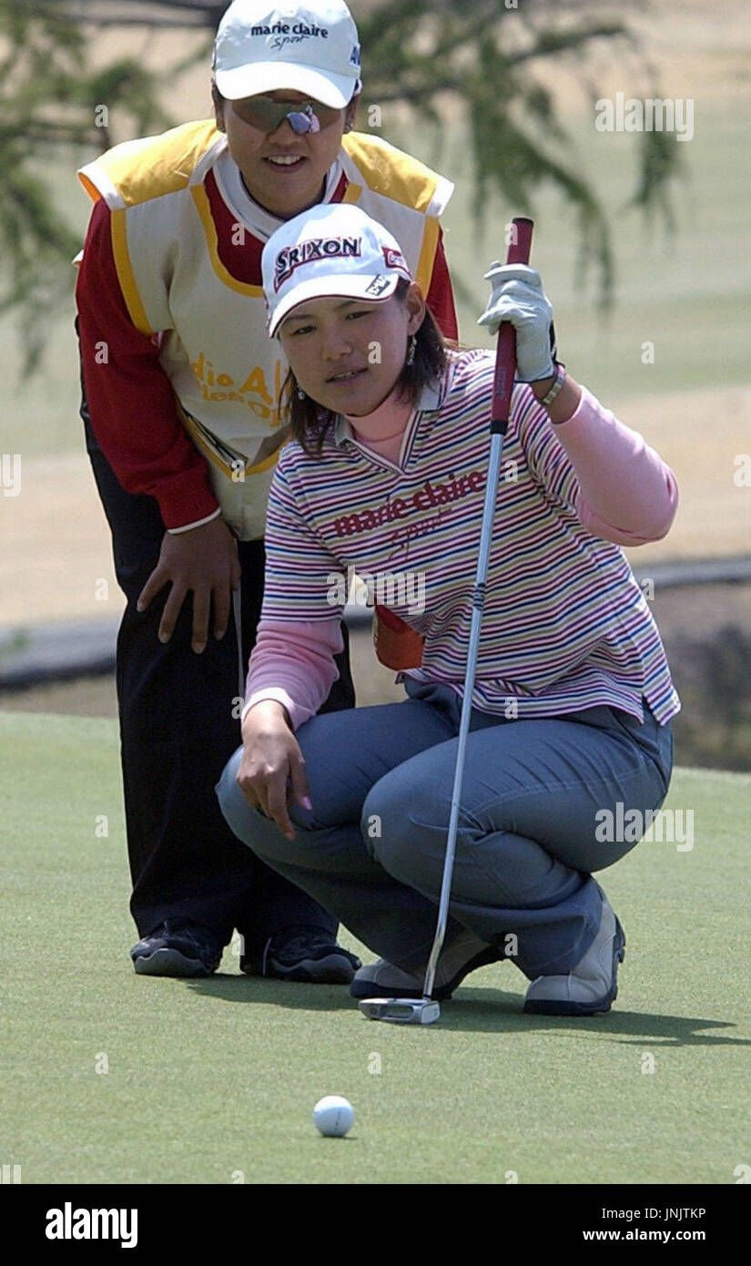 YOKAWA, Japan - Teenager Sakura Yokomine reads her putting line during ...