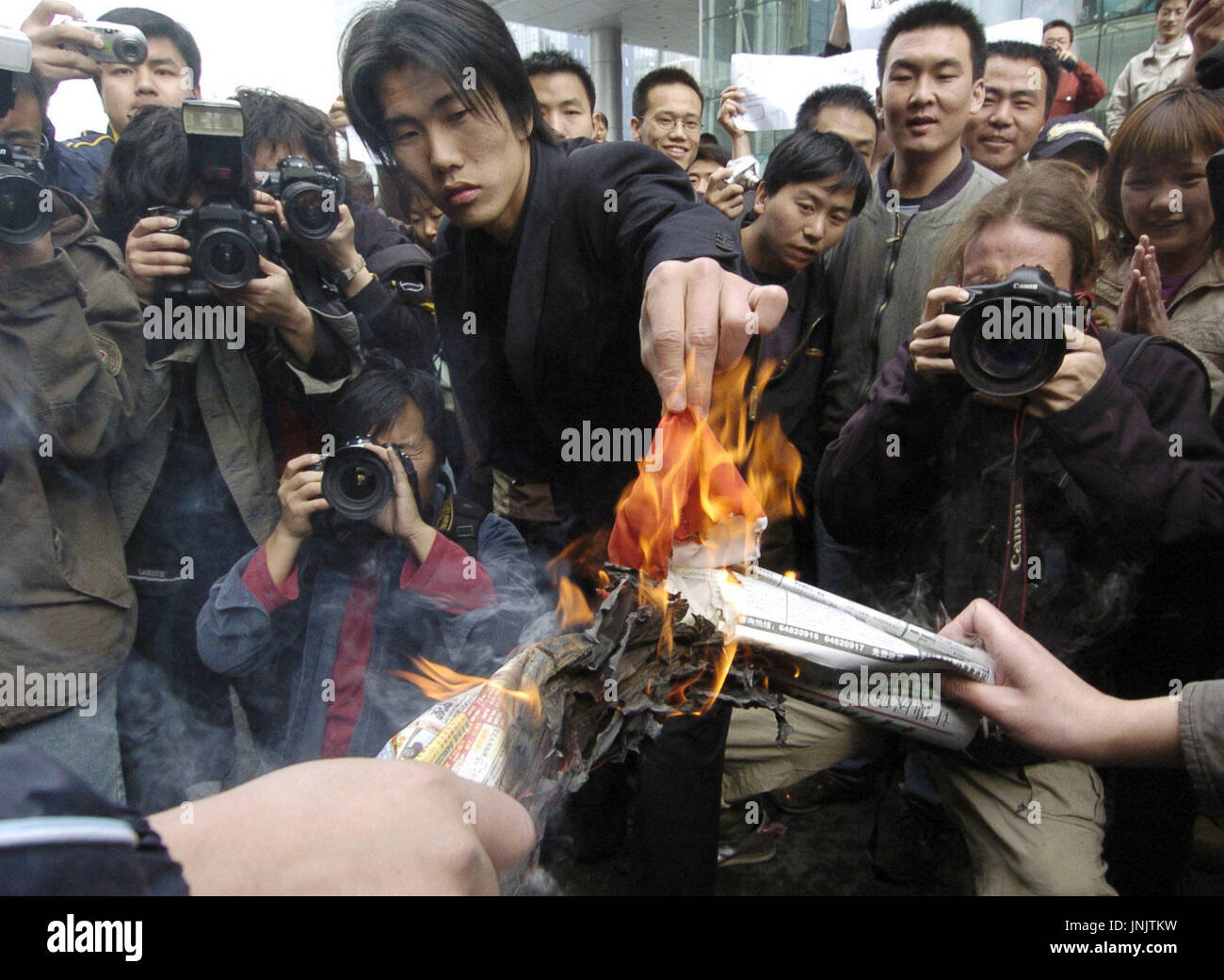 BEIJING, China - Chinese demonstrators burn a Japanese national flag ...