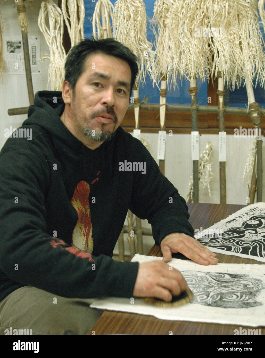 SAPPORO, Japan -Koji Yuki, 40, a wood-block artist, talks with Kyodo ...