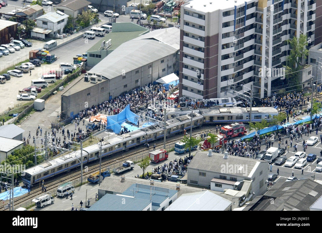 AMAGASAKI, Japan - An aerial view of a train accident on West Japan Railway Co.'s Fukuchiyama ...