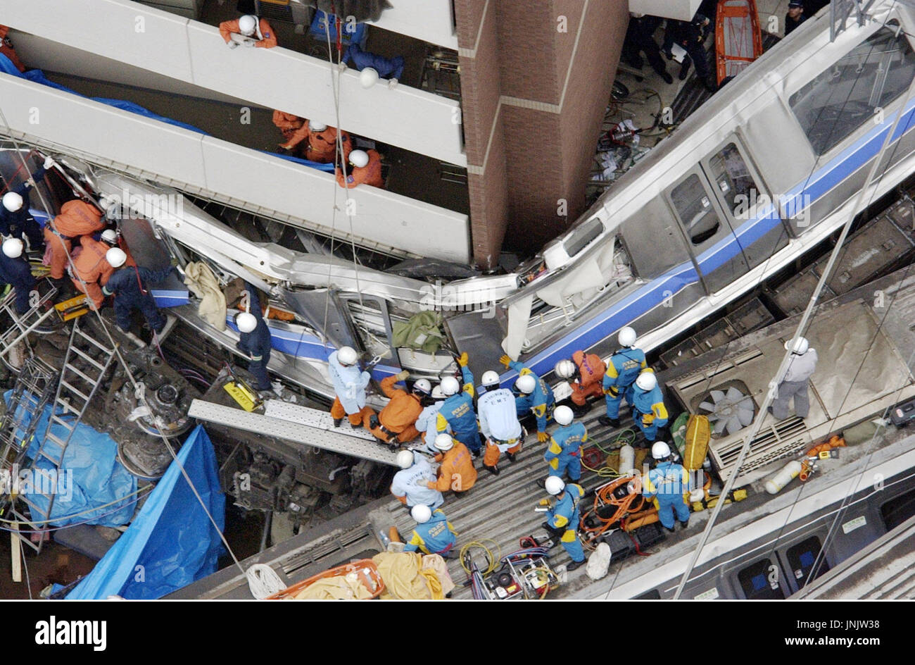 AMAGASAKI, Japan - First two cars of a seven-car commuter train of West Japan Railway Co.'s ...