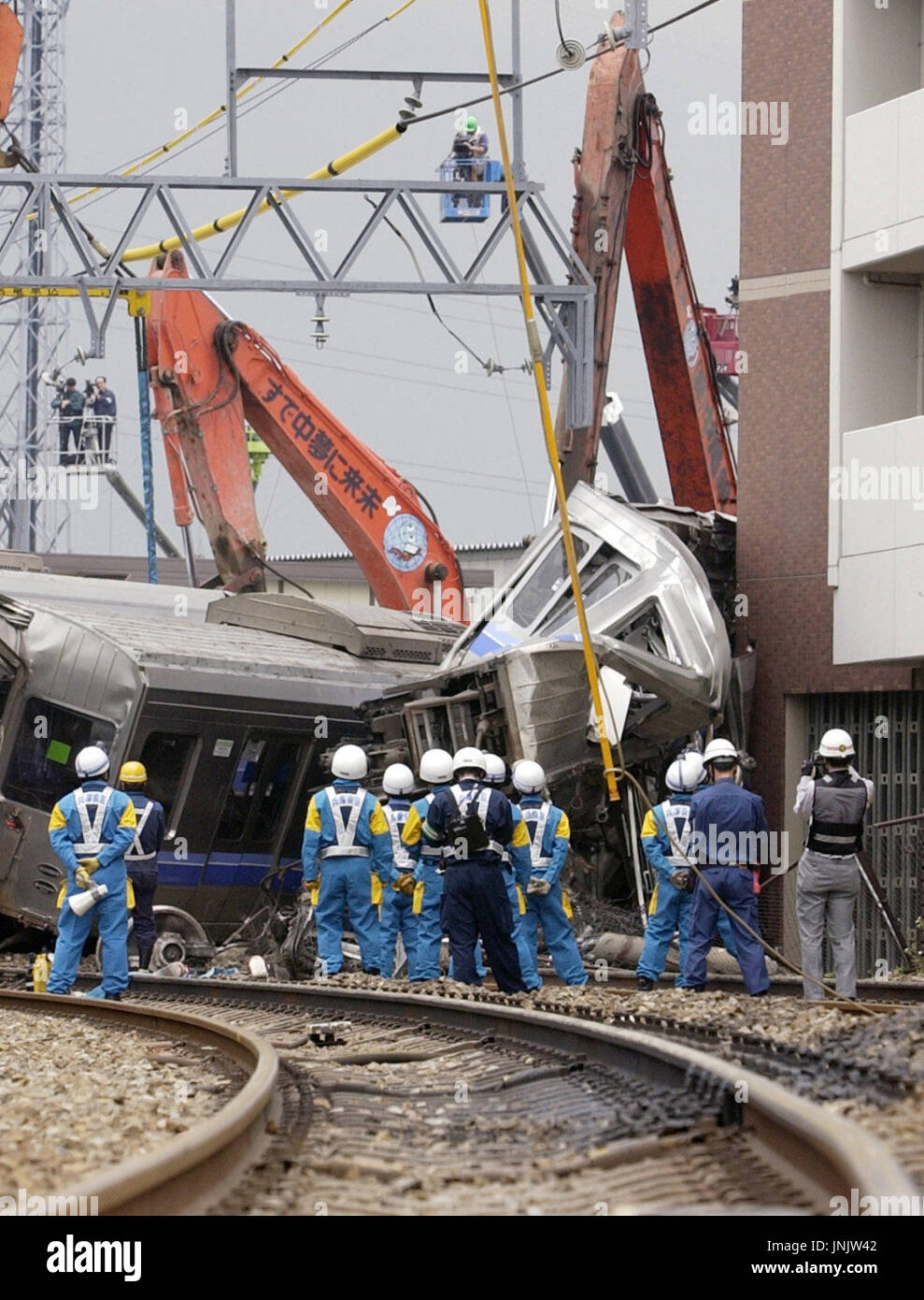 AMAGASAKI, Japan - Train cars are being demolished on April 26 at the accident site of the April ...