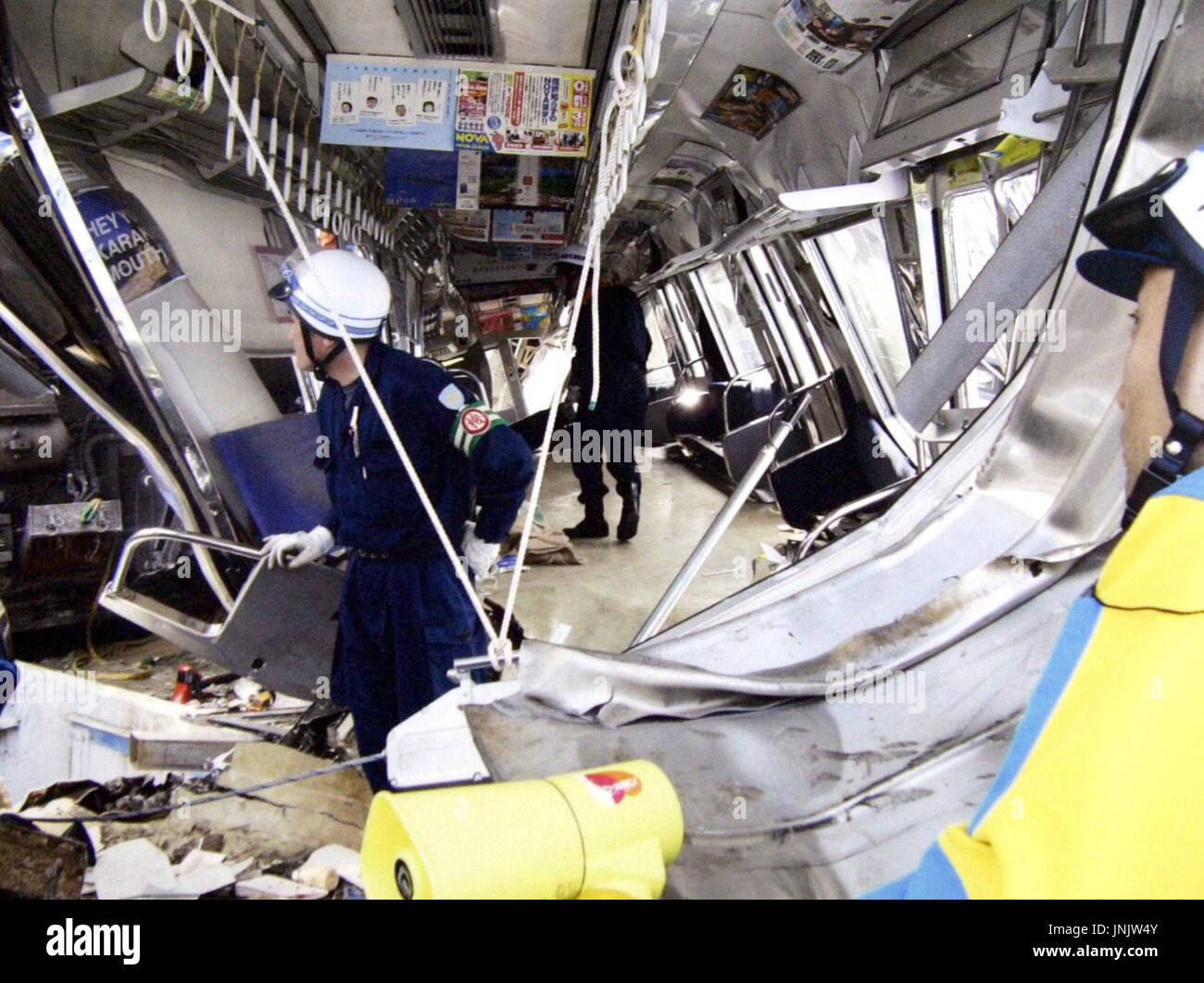 KOBE, Japan - Photo, taken by Kobe city's fire department, shows a wrecked car of a JR West ...