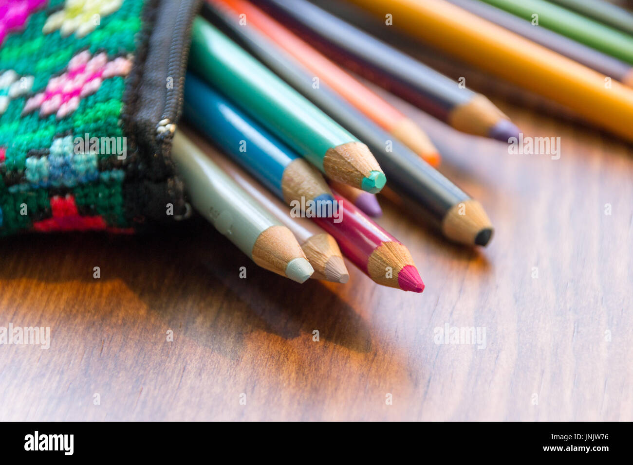 Photograph of a handcraft pencil case and colors photograph Stock Photo ...