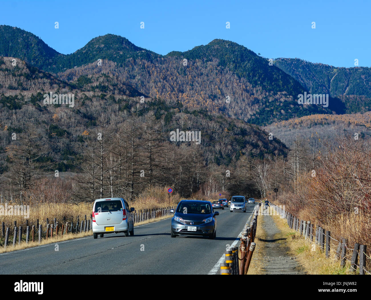 Nikko, Japan - Nov 4, 2014. Cars run on the road with mountain ...