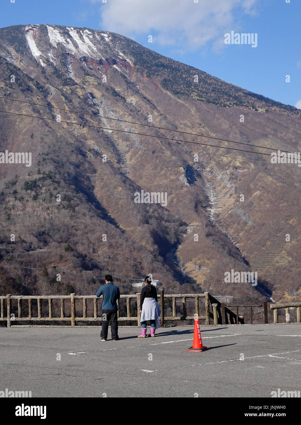 Nikko, Japan - Jan 2, 2016. People walking on mountain road in Nikko ...