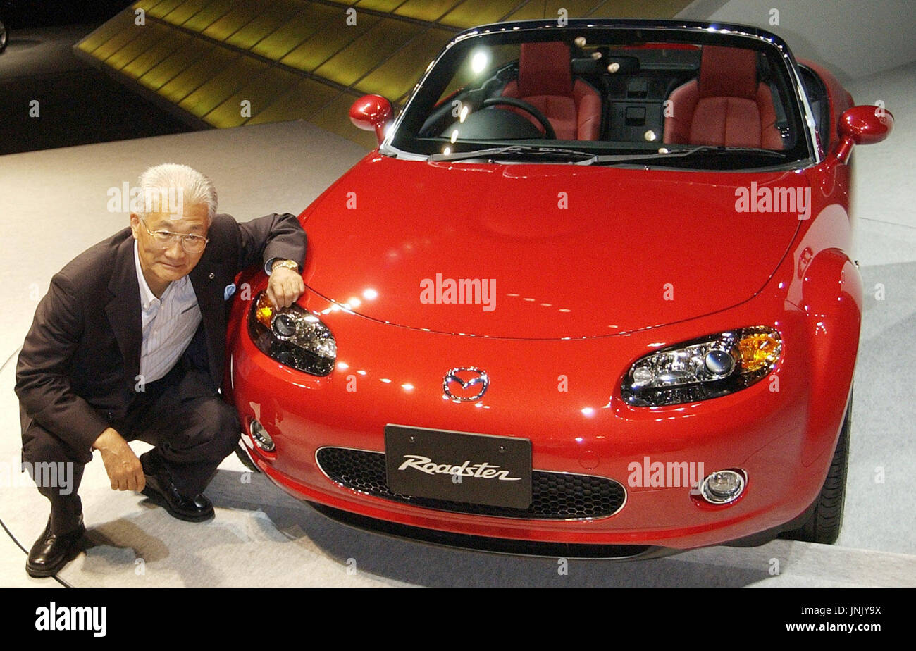 TOKYO, Japan - Mazda Motor Corp. President Hisakazu Imaki crouches ...