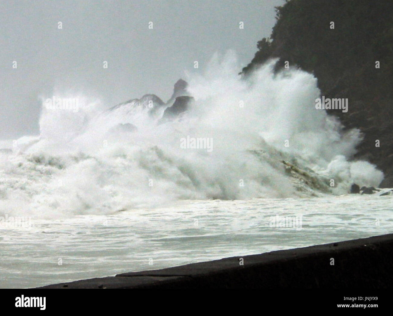AMAMI OSHIMA, Japan - Waves hit the shore of Amami Oshima Island ...
