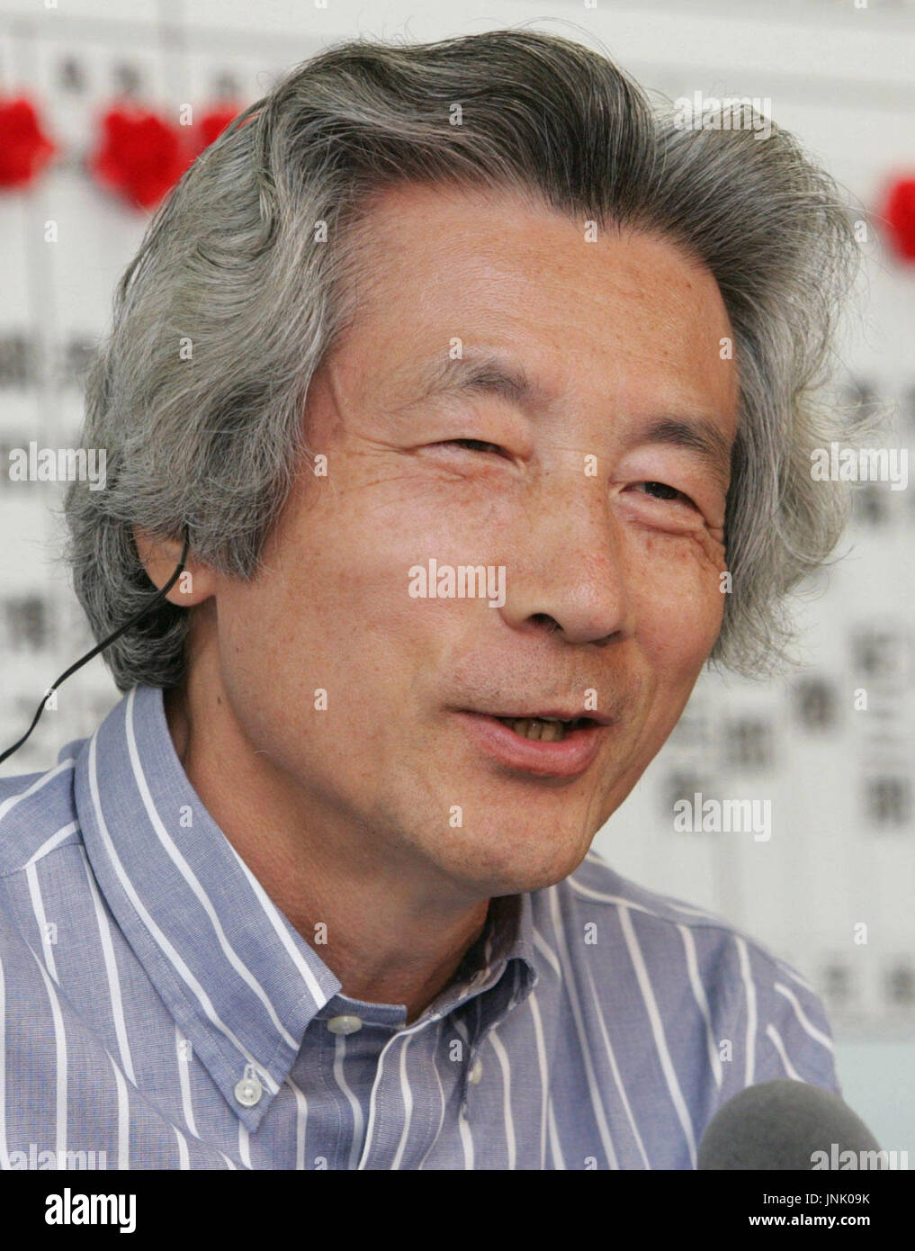 TOKYO, Japan - Prime Minister Junichiro Koizumi smiles during a TV ...