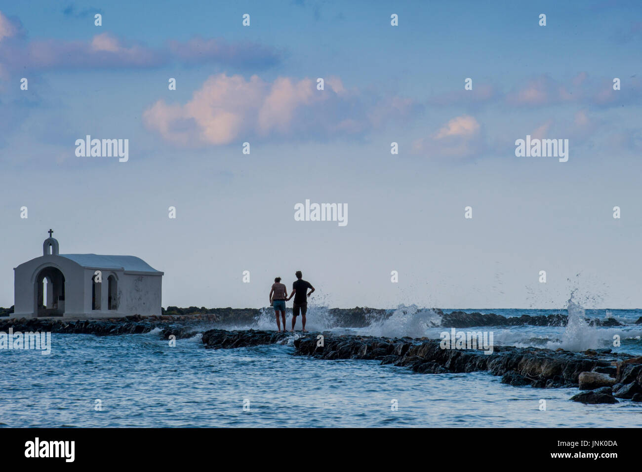 St Nicholas Chapel, a small white chapel in the sea near Georgioupolis ...