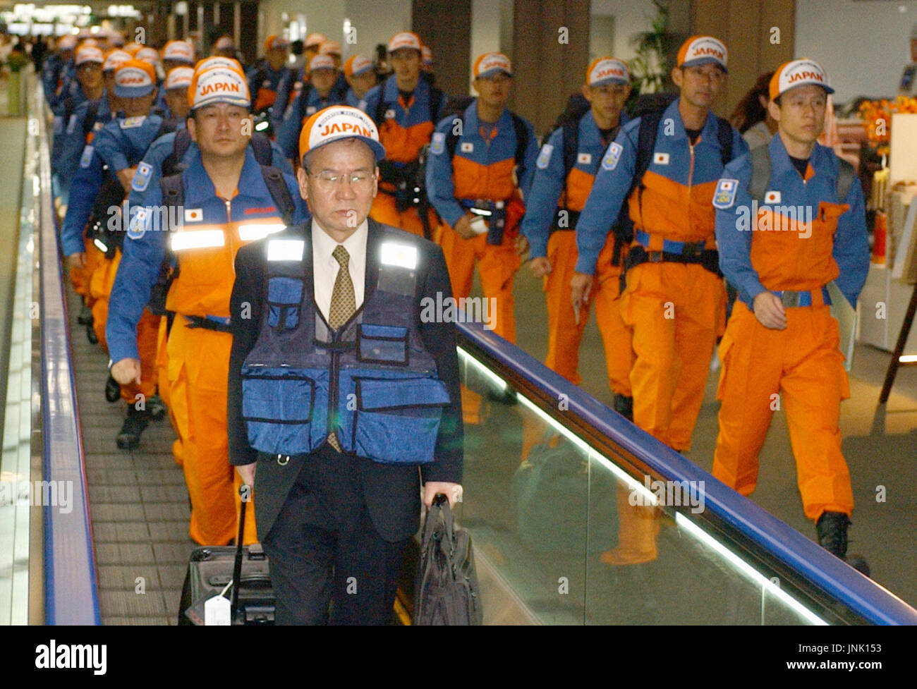 NARITA, Japan - A 49-member Japanese emergency rescue team leaves ...