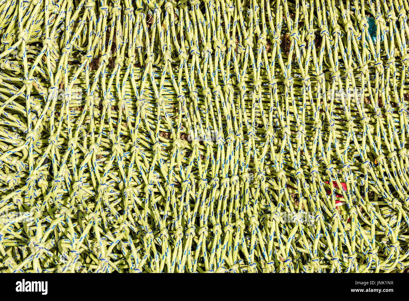 Fishing net background Stock Photo - Alamy