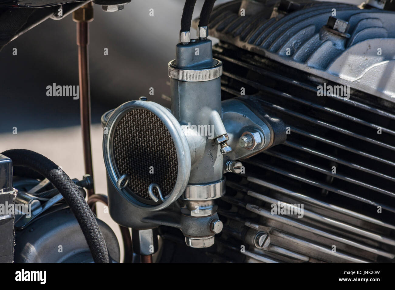 Old antique motor and its carburettor at the engine Stock Photo - Alamy