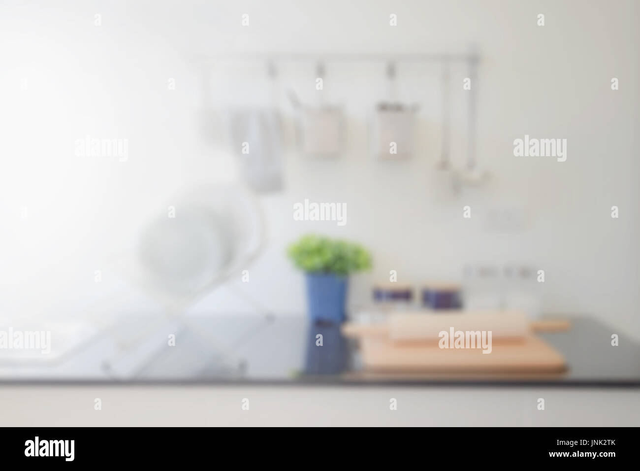 blurred image of modern kitchen interior for background Stock Photo - Alamy