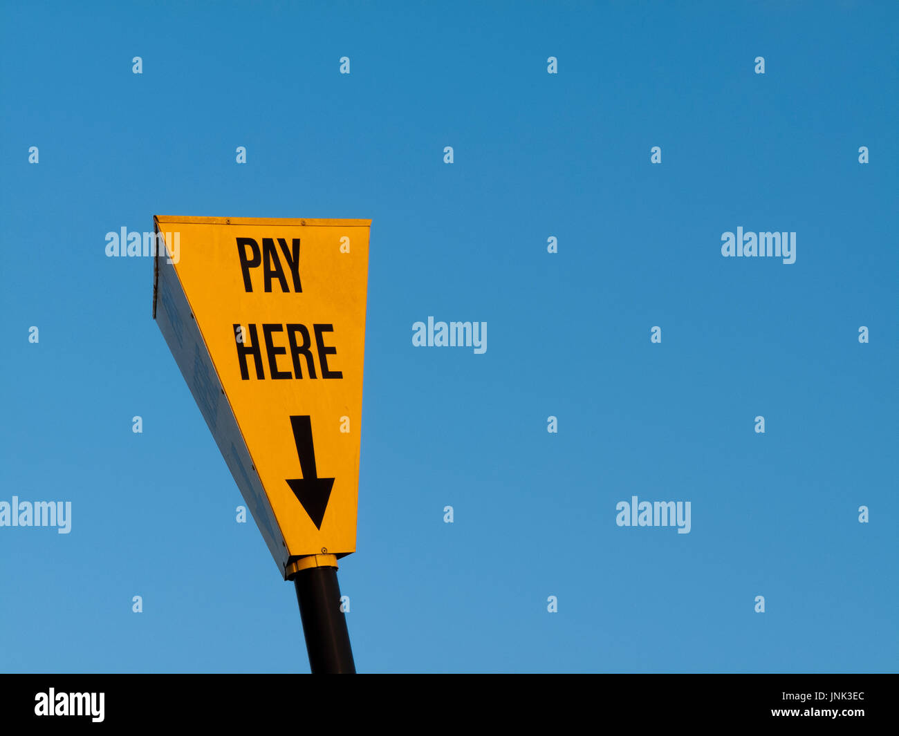 Pay here sign for pay and display public carpark Stock Photo - Alamy