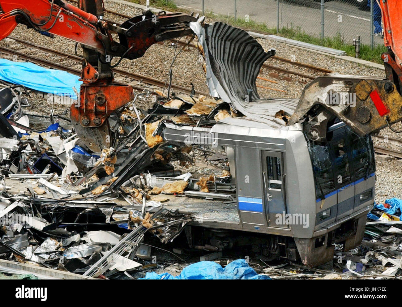 AMAGASAKI, Japan - Workers continue to dismantle the fourth car of a JR West train, which ...