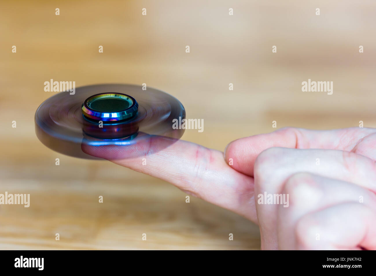 Hand spinner fidget finger toy hi-res stock photography and images - Alamy
