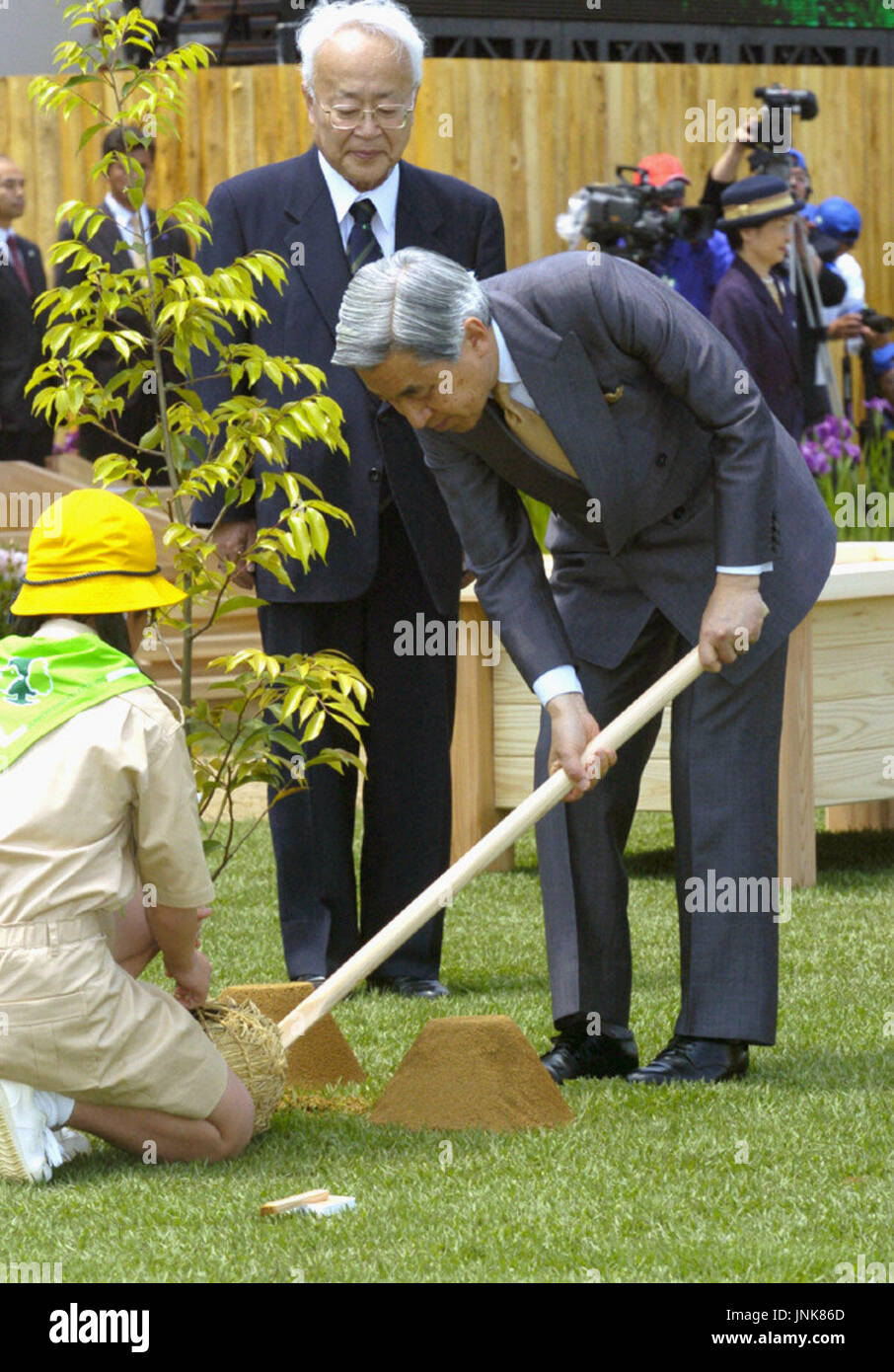 ITAKO, Japan - Emperor Akihito plants a tree during a national tree ...