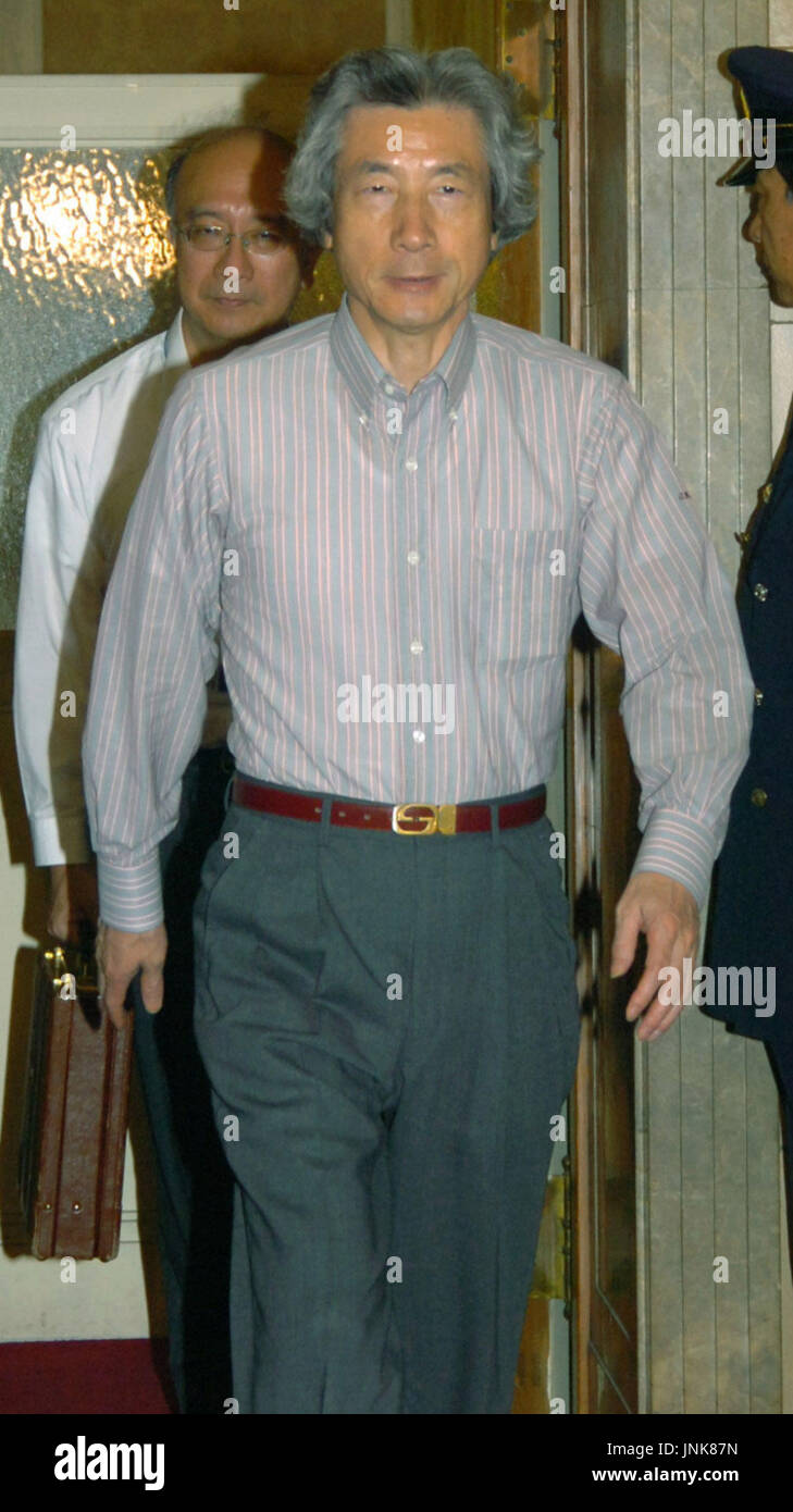 TOKYO, Japan - Prime Minister Junichiro Koizumi emerges from a meeting ...