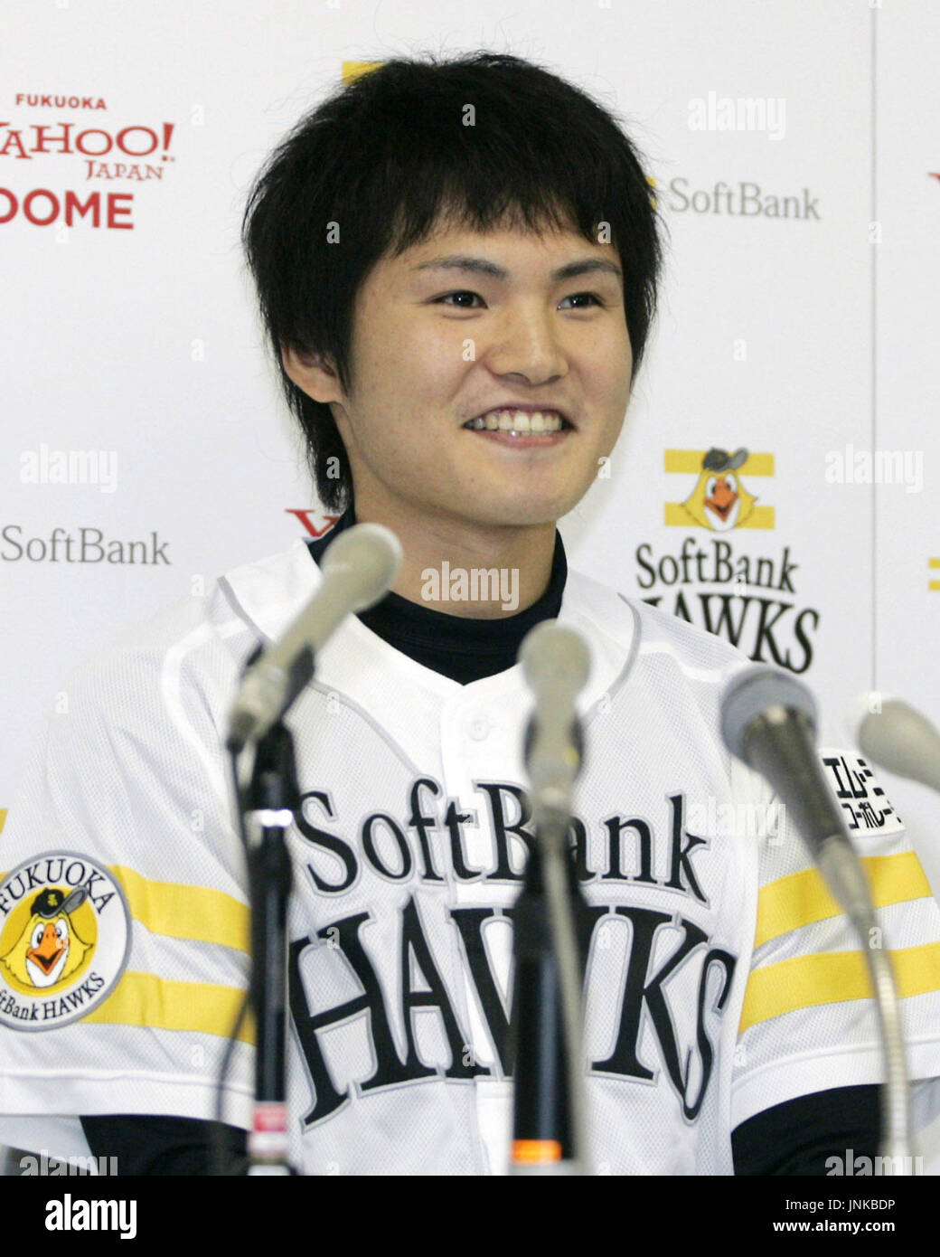 TOKYO, Japan - Softbank Hawks pitcher Toshiya Sugiuchi smiles at a news conference in Fukuoka on ...