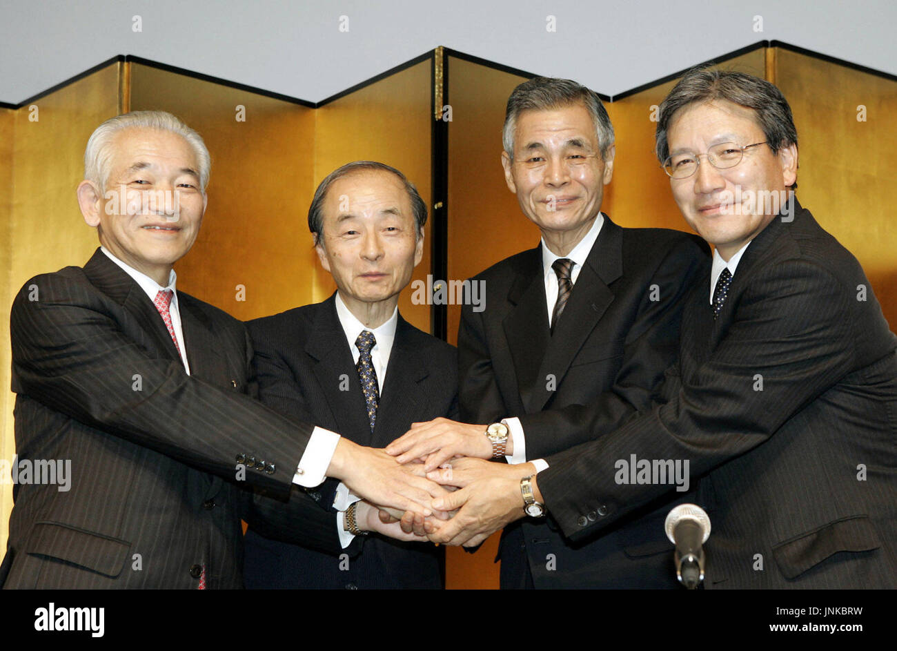 TOKYO, Japan - (From L to R) Inpex Corp. President Naoki Kuroda, Chiarman Kunihiko Matsuo and ...