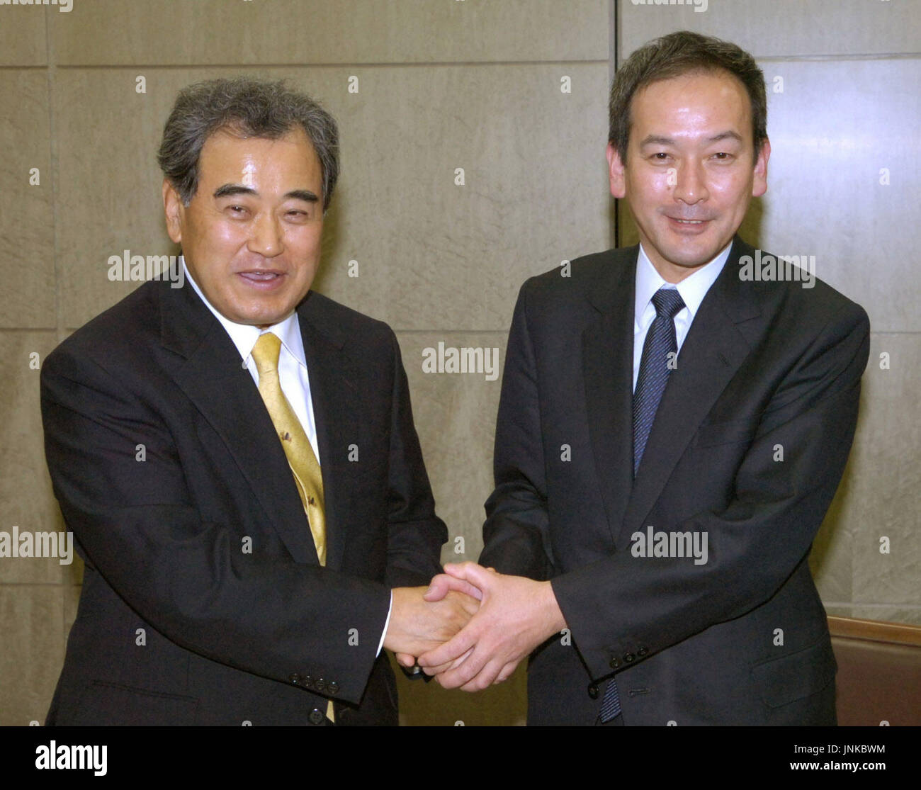 TOKYO, Japan - Yoshikazu Sashida (L), president of Nisshinbo Industries ...