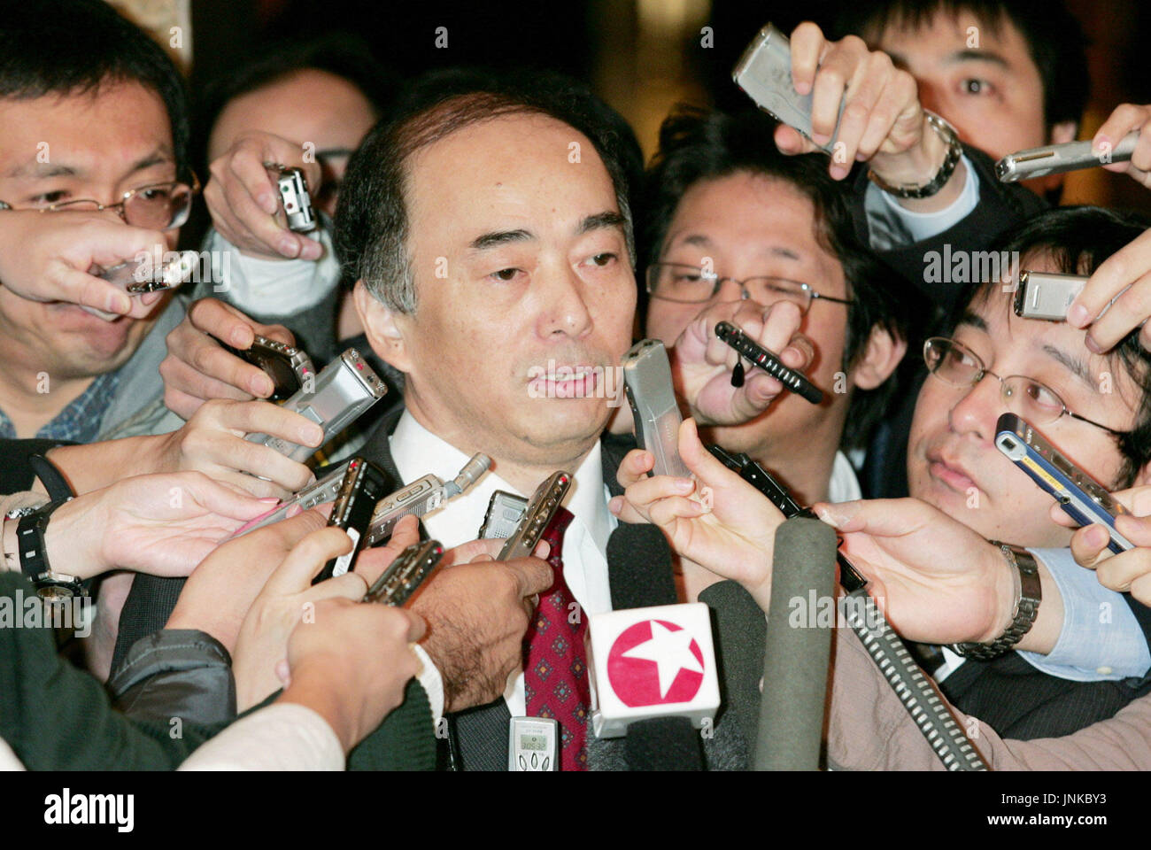 BEIJING, China - Japan's chief delegate Kenichiro Sasae speaks with ...