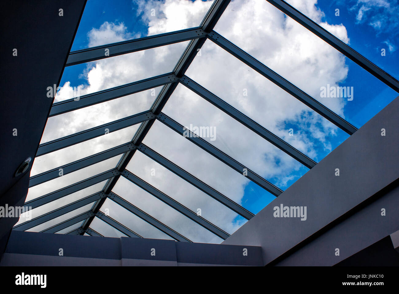 Blue sky through glass roof hi-res stock photography and images - Alamy