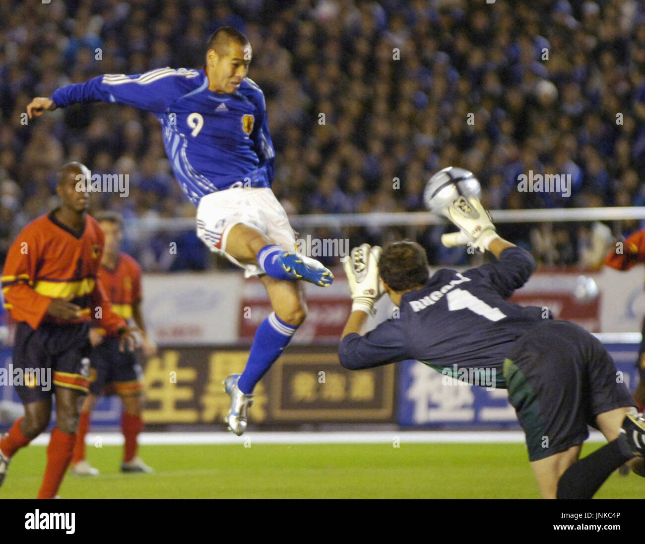 TOKYO, Japan - Japan forward Naohiro Takahara is denied by Angola ...