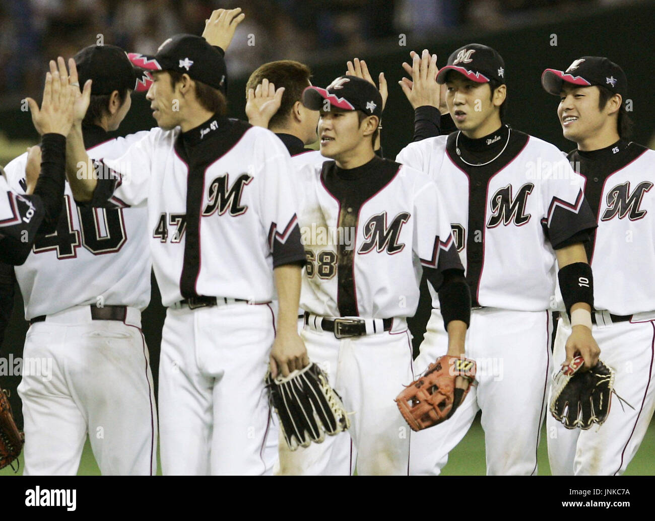 TOKYO, Japan - Japan Series champion Lotte Marines players celebrate ...
