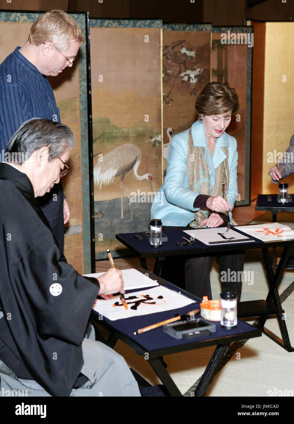 KYOTO, Japan - U.S. First Lady Laura W. Bush tries calligraphy during ...