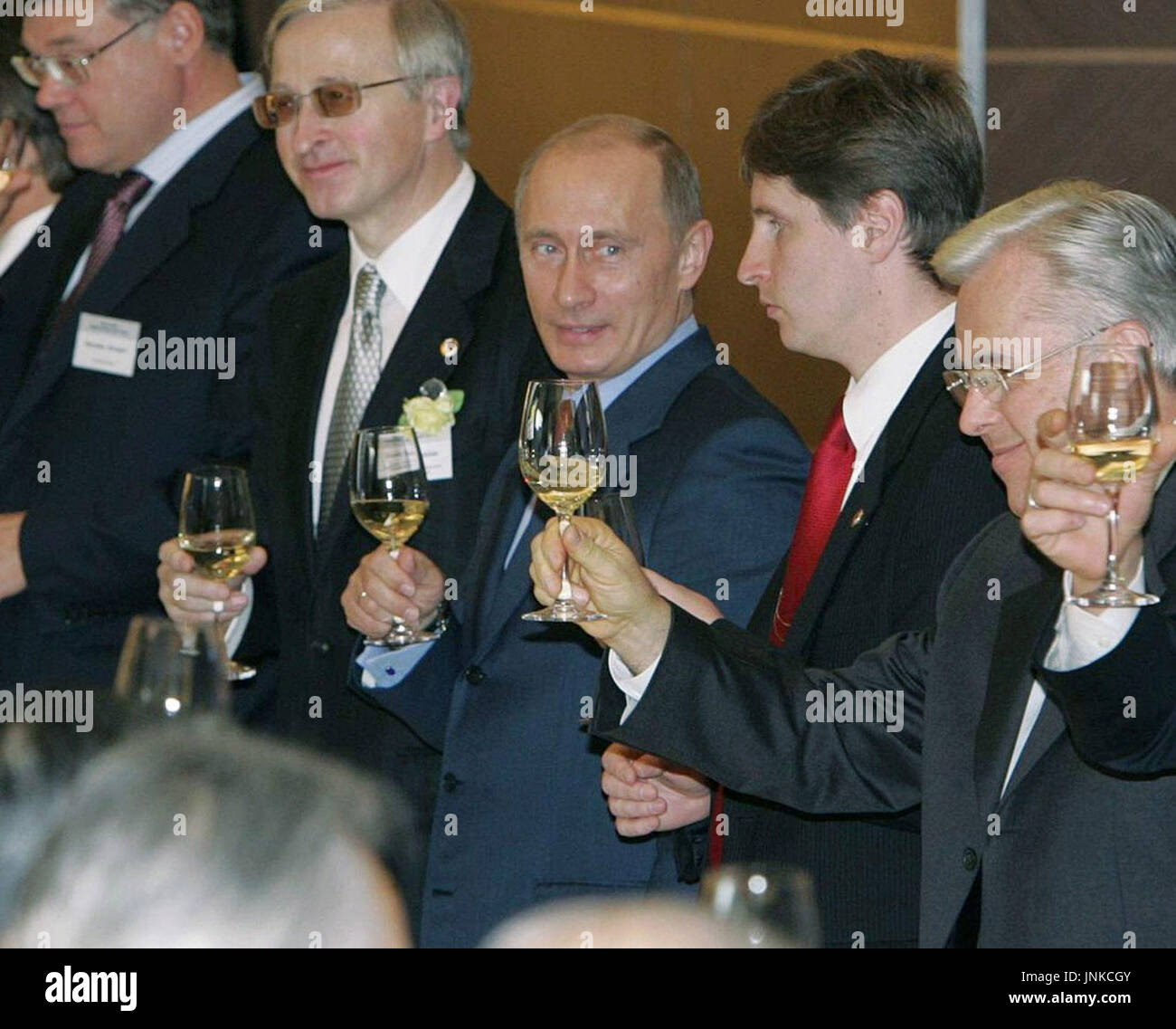TOKYO, Japan - Russian President Vladimir Putin (C) makes a toast ...