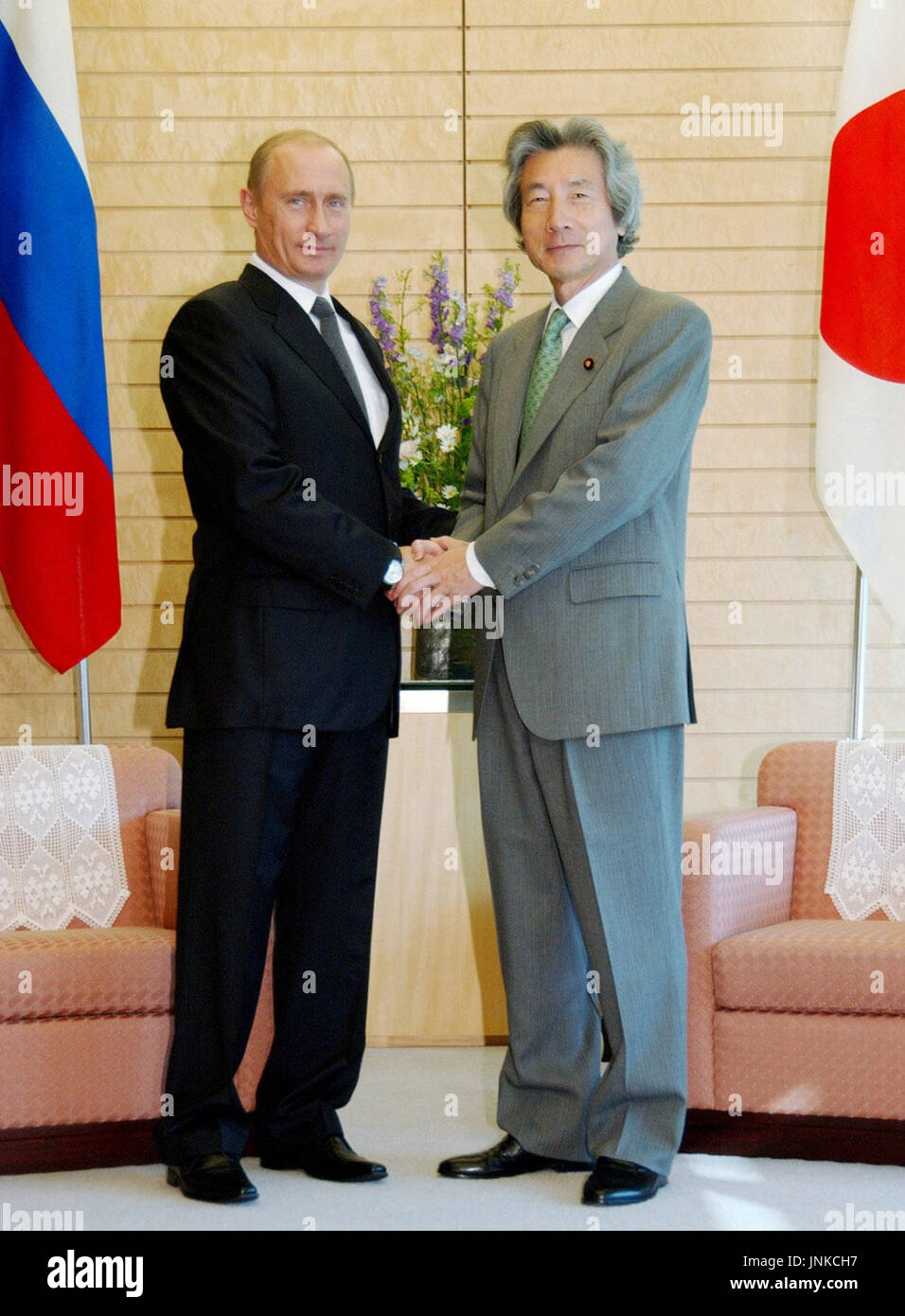 TOKYO, Japan - visiting Russian President Vladimir Putin (L) and ...