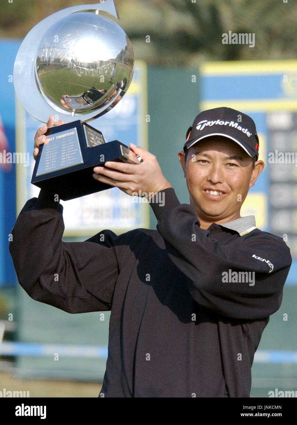 KOCHI, Japan - Toru Taniguchi smiles with his cup in hands after ...